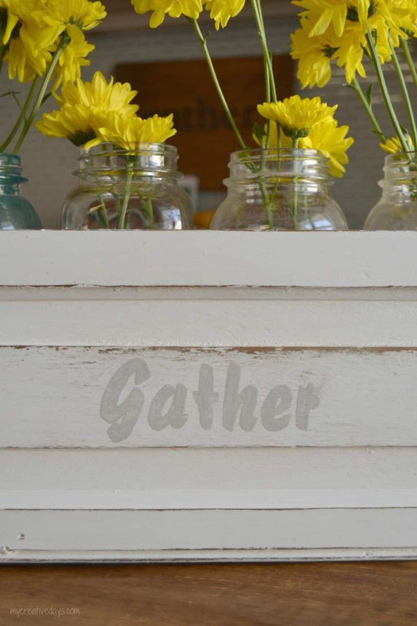 A DIY Mason jar caddy that will display your favorite jars in a new way!
